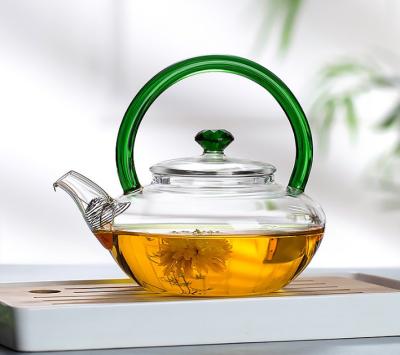 China Novolink OEM 650ML High Borosilicate Glass Teapot With SS String Infuser & Jade Green Glass Handle for sale