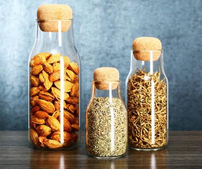 China Heat Resistant Borosilicate Clear Glass Canisters Jar With Cork Lid for sale