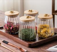 China OEM 650ml 750ml Leak Proof Glass Bottle Canister Glass Jar With Bamboo Lid for sale