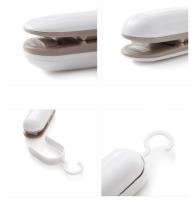 China Plastic Pouch Sealing Mini Bag Sealer and Cutter for Portable Paper Packaging Material for sale