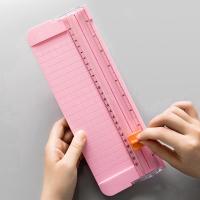 China ZEQUAN Small Orange Paper Cutter for Children's DIY A5 Mini Manual Paper Trimmer for sale