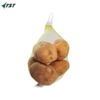 China Yellow Color 1kg 2kg PP Netting Bag For Vegetable Potato Packaging With Label for sale