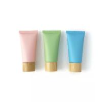 China Custom Bamboo Tube Packaging 50ml 60ml 80ml Cosmetic Squeeze Tubes with Natural Bamboo Lid for Skincare Products for sale