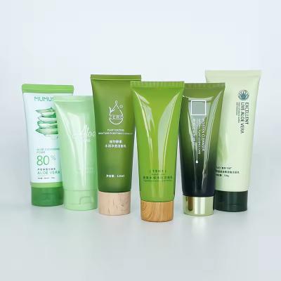 China PET Bamboo Tube Packaging 60ml-300ml Dark Green Cosmetic Container with Screen Printing Customization for sale