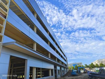 China 16,800㎡ steel structure building with partial four floors, adopting polyurethane sandwich wall panels for superior insulation performance. for sale