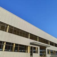 China 16,800㎡ steel structure building with partial four floors, adopting polyurethane sandwich wall panels for superior insulation performance. for sale