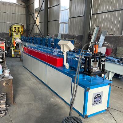 China PLC Control Punching Hole Shutter Door Roll Forming Machine Customized Garage Shutter Making Machine Punching Hole Rolling Shutter Door Roll Forming Machine Galvanized Steel Door Slat Production Line for sale