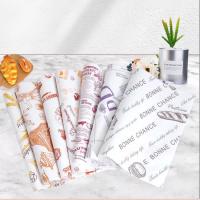 China 40gsm Greaseproof Food Wrapping Paper 10x10 Cake Packaging Jumbo Roll for sale