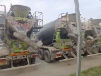 China Used Zoomlion HOWO Concrete Mixer Truck 12 m³ Capacity with 6.87L Engine and 248 KW Power for sale