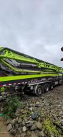 China 2023 Zoomlion Sitrak 70m Lingyun II Concrete Pump Truck 69.1m Reach 180m³/h Output for sale