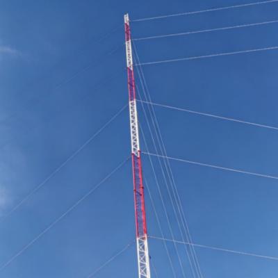 China Hot dip galvanized steel tube tower with rigorous design for uniform force distribution and resistance to wind earthquake and corrosion for sale