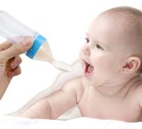 China Portable Silicone Squeeze Feeder With Spoon Heat Resistant Odorless for sale