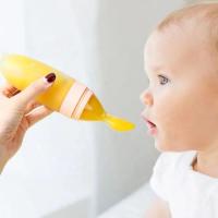 China Reusable Baby Bottle Spoon Nontoxic , Multipurpose Squeezy Silicone Food Feeder for sale