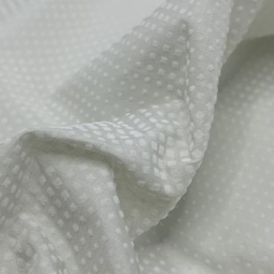 China 70D 100% Nylon Grid Fabric with Flocking & Luminous Finish for Sunscreen & Down Jackets for sale