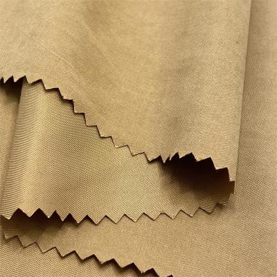 China 85% Polyester 15% Nylon Brushed Twill Peach Skin Beach Pants Fabric - 100gsm Soft Velvet Material for sale