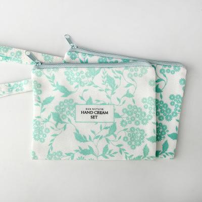 China Custom Logo Eco Friendly RPET Makeup Travel Green Zipper Packaging Bag For Cosmetic for sale