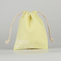 China Lemon Color Eco Friendly Organic Muslin Cotton Pouch Promotional Small Drawstring Bag for sale