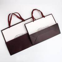 China Paper Bag With Your Own Logo Shopping Packaging Bag With Ribbon Handle for sale