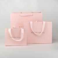China 200gsm Paper Custom Made Shopping Bags Pink Paper Retail Bags With Ribbon Handle Logo for sale