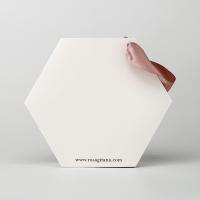 China Special Design Hexagon Jewelry Paper Bag Custom Paper Shopping Bags With Ribbon for sale