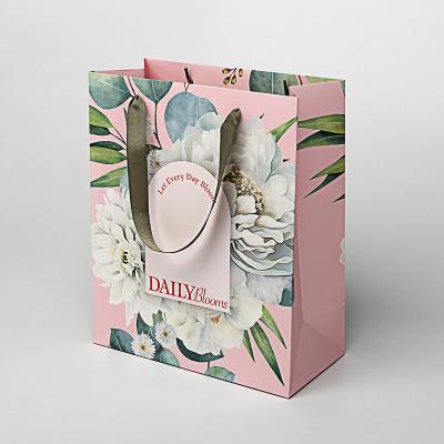 China Hot Stamping Logo Matte Paper Bag Shopping Colorful Bag With Cotton String​ for sale