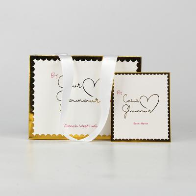 China Custom Small Gift Bag Jewelry Bag Small Paper Bag Luxury Gold Foil Packaging Bag for sale
