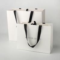 China Sustainable Eco-Friendly Fancy Custom Bamboo Paper Shopping Gift Bags for sale