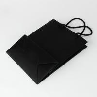 China Paperboard Black Custom Paper Shopping Bag With Soft Handle for sale
