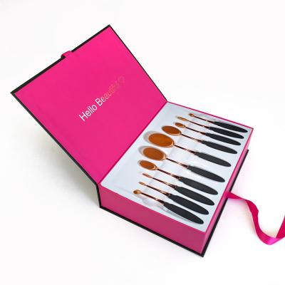 China Pink Book Shape Ribbon Closure Make Up Shipping Cardboard Gift Packaging Boxes Makeup Brush Box With Plastic Blister Tra for sale