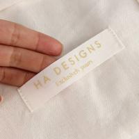 China Custom Design Drawstring Cosmetic Packaging Bag pouch With Fabric Label for sale