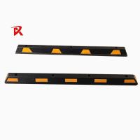 China 183cm Long Size 14kgs Yellow Rubber Reflective Tape Speed Bump Car Wheel Stopper Parking Lot Block for sale