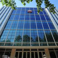 China Q355 Low E Glass Curtain Wall 120mm Double Glazed Glass Curtain Bending for sale
