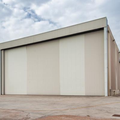 China Custom Steel Roof Structure Foundation 50mm Prefabricated Workshop Sheds for sale