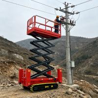China Self Leveling Mobile Compact Rough Terrain Scissor Lift 320kg For Uneven Ground for sale