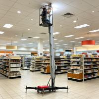 China 6m 10m 12m Aerial Vertical Mast Lift Industrial Cherry Picker Customized for sale