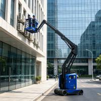 China Gravel Terrain Electric Tracked Vertical Mast Lift Self Propelled 7m-10m Custom for sale