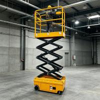 China Construction Mini Personnel 19ft Electric Scissor Lift High Reach Movable for sale