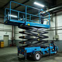 China Pneumatic Rough Terrain Industrial Scissor Lift Outdoor Self Propelled 500KG 26