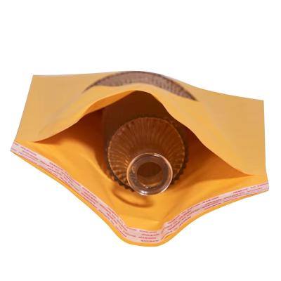 China Biodegradable Kraft Paper Honeycomb Padded Mailer Envelope for Shipping Socks Shoes Fur for sale