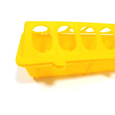 China 28 Holes 50cm Long Plastic Poultry Feeder Manual For Pigeon Bird for sale