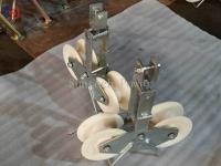 China Durable Tandem Sheave Stringing Block for Bundle Conductor Stringing on High Voltage Power Lines with 25KN Rated Load for sale