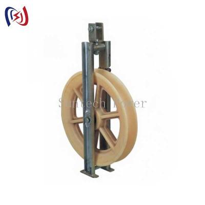 China Precision OPGW Cable Stringing Block with 660x110mm Sheave Size and 20-50KN Rated Load for Protecting Optical Fibers for sale