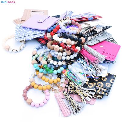 China Custom PU Leather Keychain Wallet with Wristlet Bangle Bracelet 12cm x 10cm for sale
