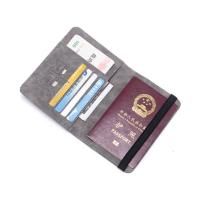 China Leather Passport Cover Case with Stamping Simple Plane Design for Travel Documents and Credit Cards for sale