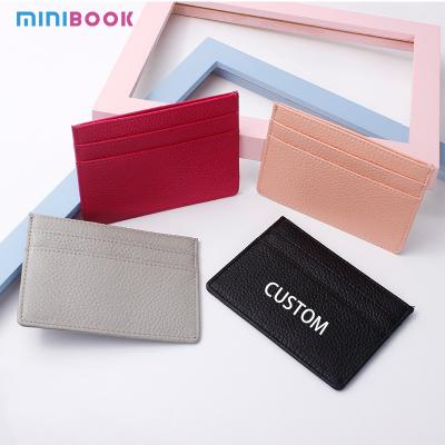 China Genuine Leather Slim Embossed Credit Card Holder Wallet with UV Print Monogrammed Custom Logo for sale
