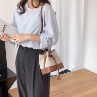 China Women's Fashion Crossbody Bag Drawstring Pleated Bucket Handbag 25cm Shoulder Bag for sale