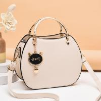 China Custom Logo Cat Pendant Women's Handbag with Zipper Closure 2024 New Style for sale