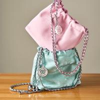 China Women's Mini Bucket Bag with String Chain Waterproof Shiny Leather 20cm for sale