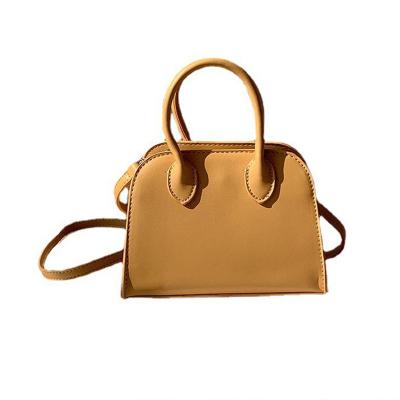 China Classic PU Leather Small Tote Handbag for Women Adjustable Strap Daily Use 2024 for sale