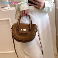 China Solid Color Cowhide Leather Saddle Bag Small Portable Crossbody Zipper Closure 20cm for sale